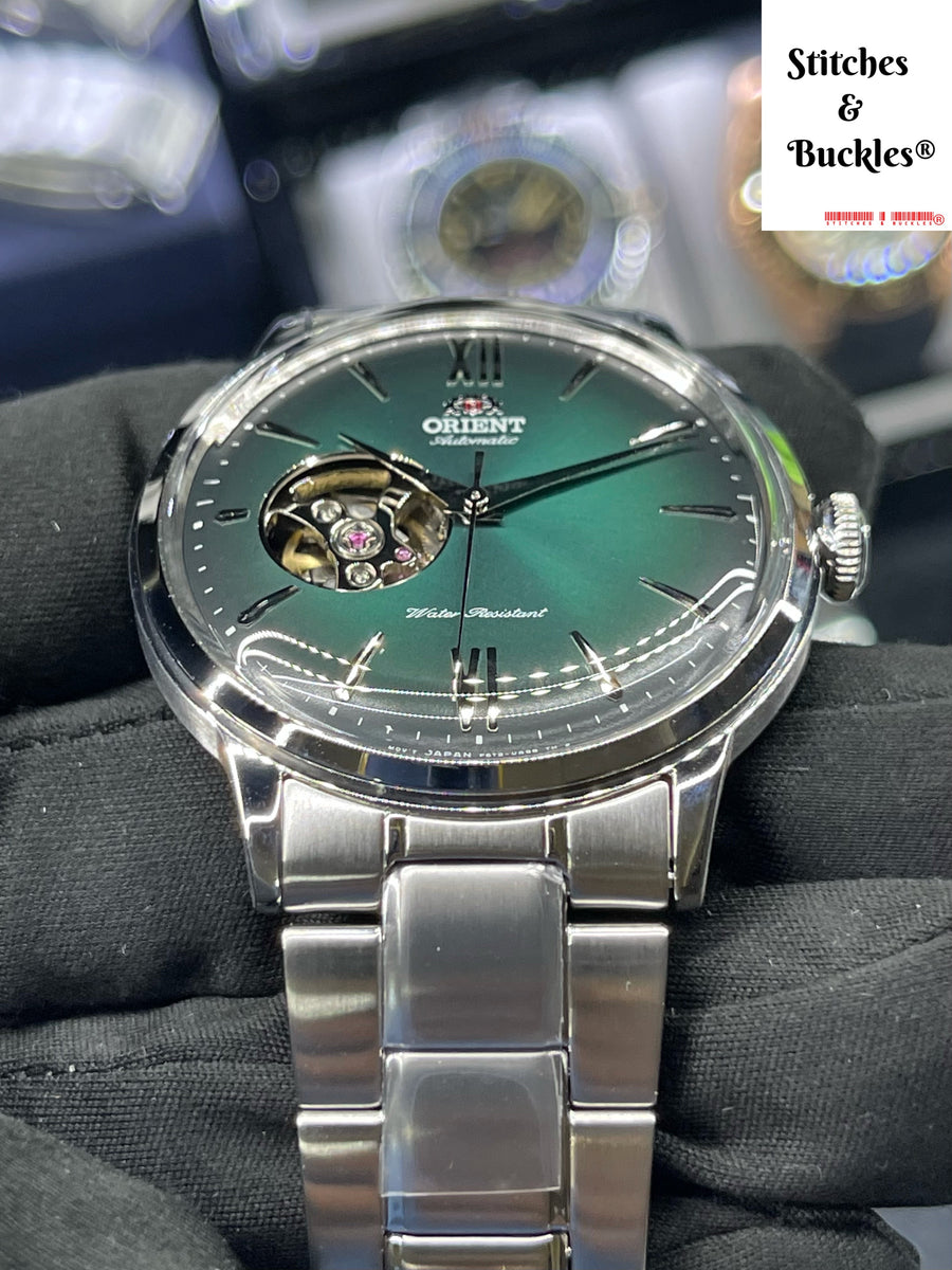 Orient Classic ‘HELIOS’ Green Dial Open Heart RA-AG0026E – Stitches and ...